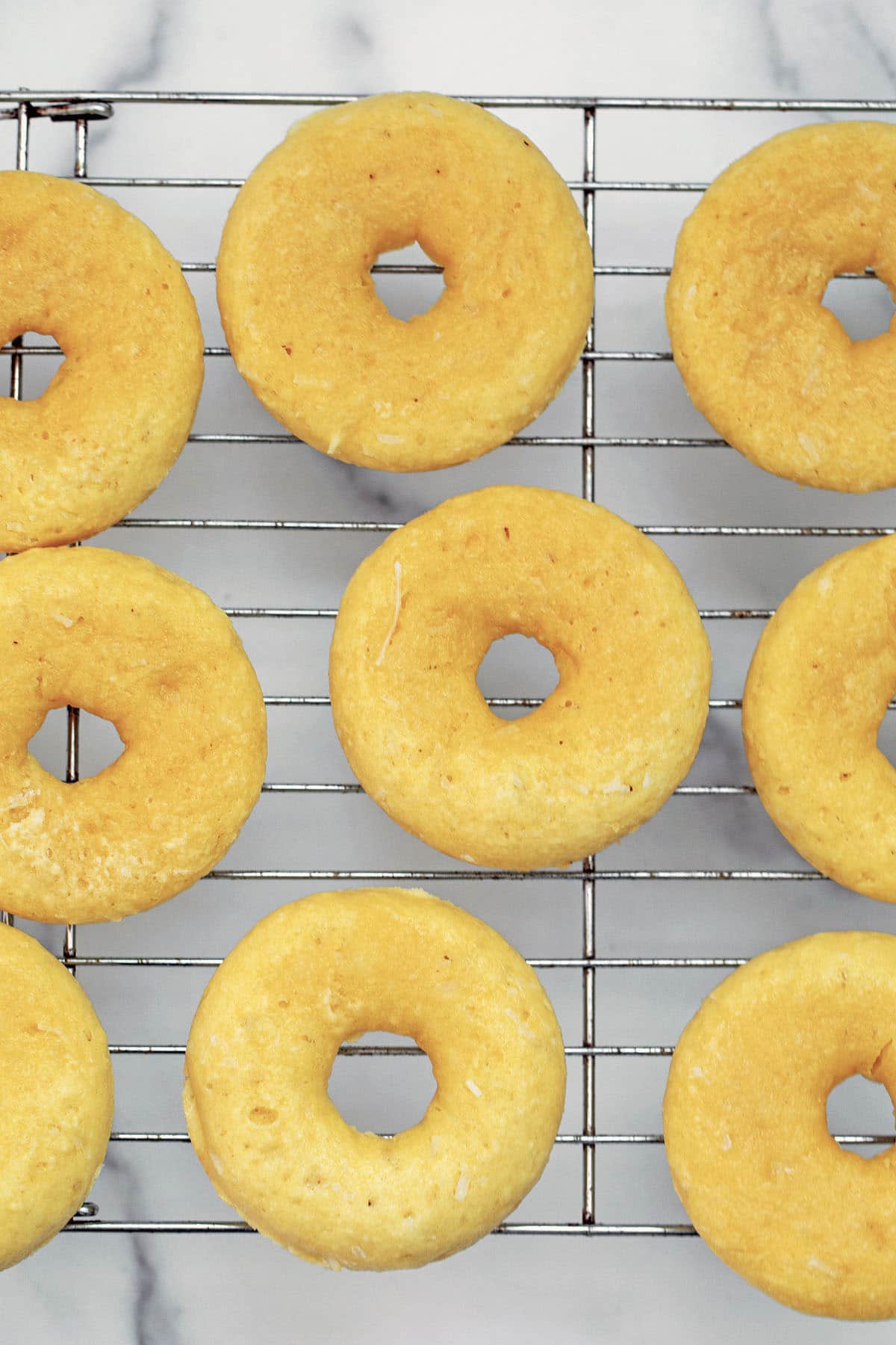 Coconut Doughnuts with Salted Caramel Icing Recipe | We are not Martha