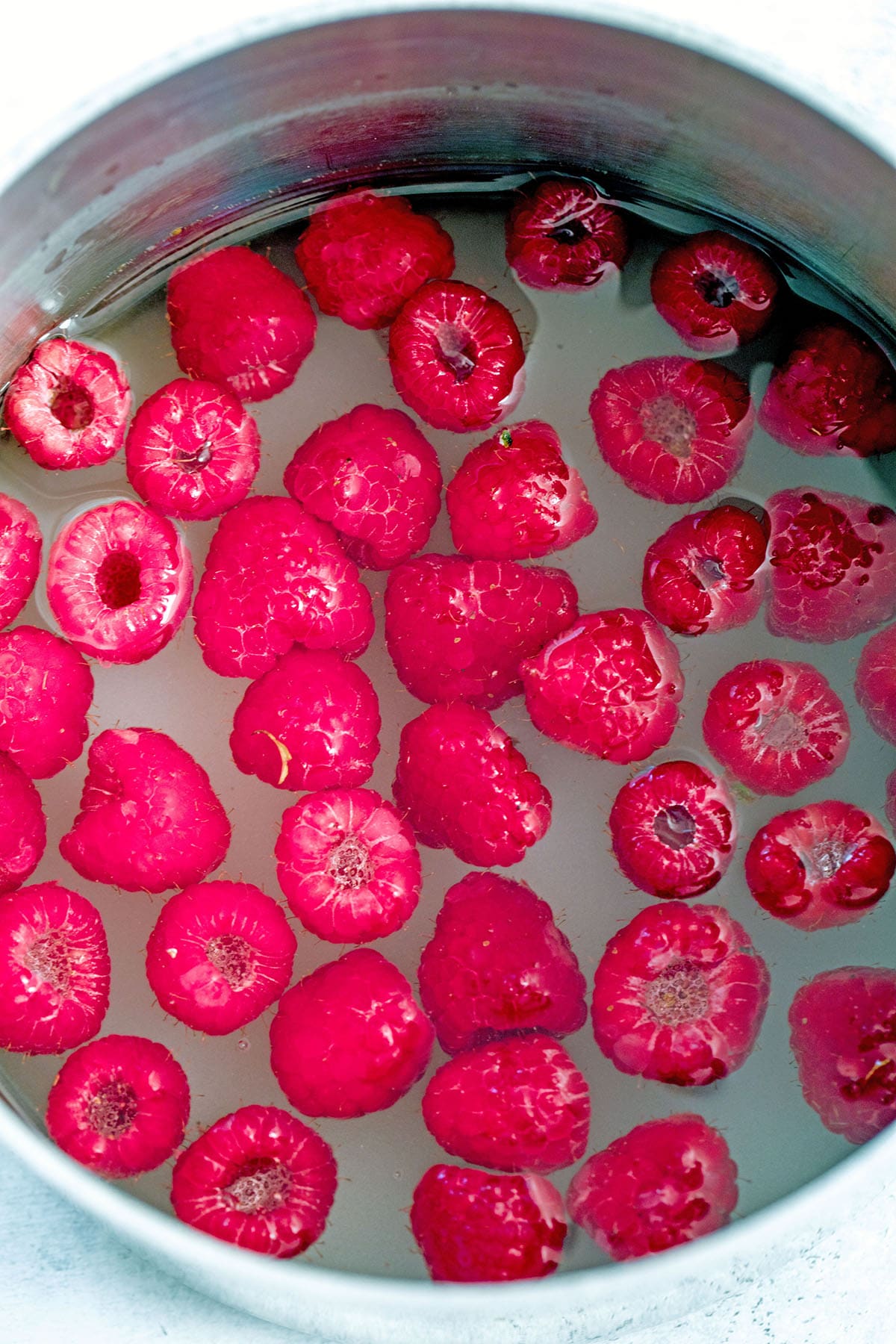 Spicy Raspberry Whiskey Sour Recipe | We are not Martha